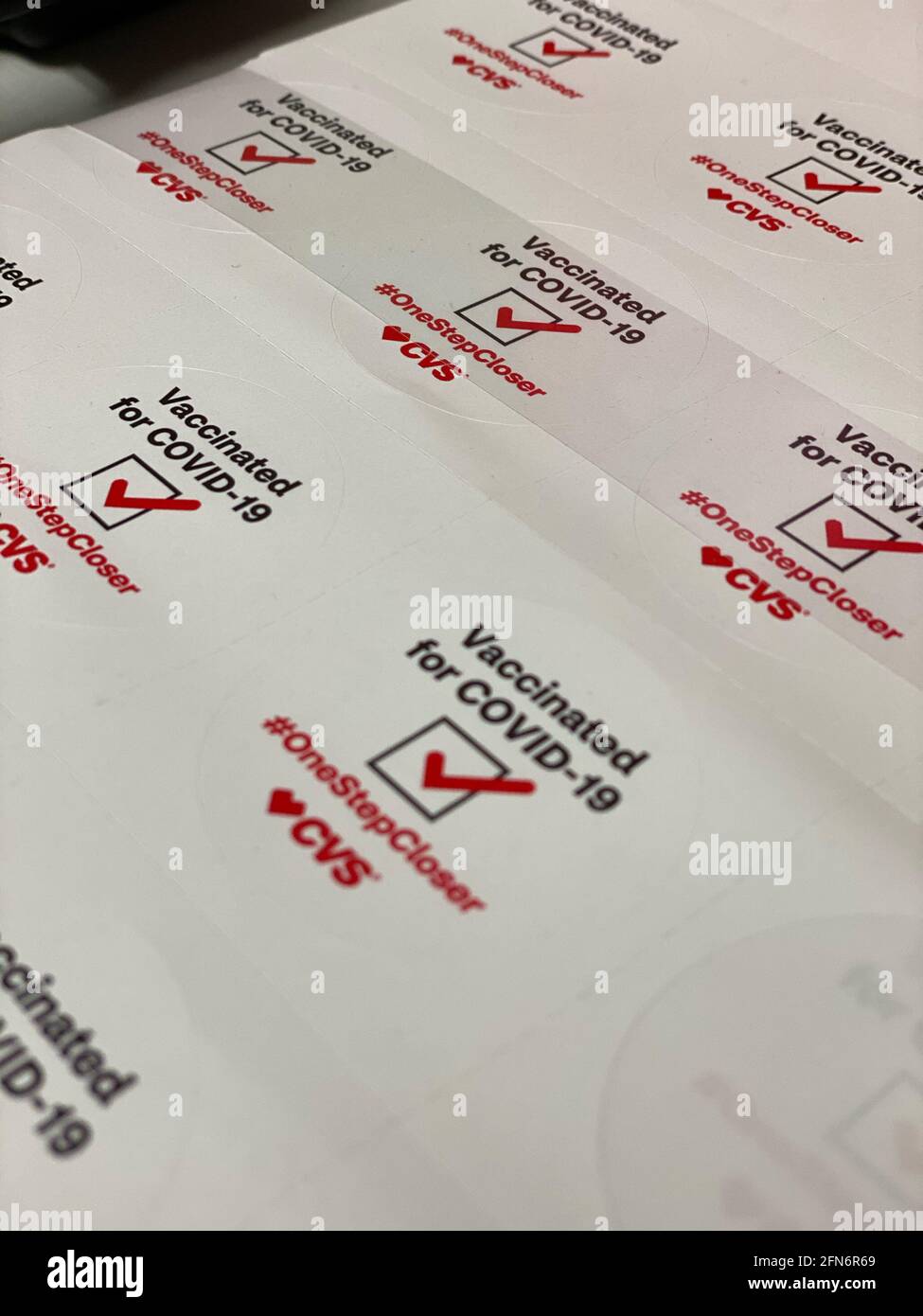 Media, Pennsylvania, USA. 14th May, 2021. Stickers promoting ...
