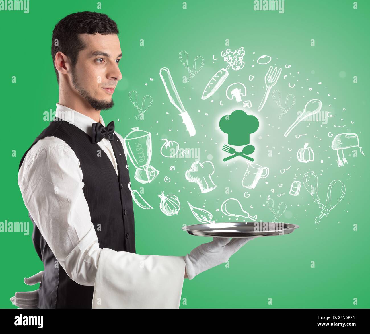 Waiter holding silver tray with food icons above Stock Photo - Alamy