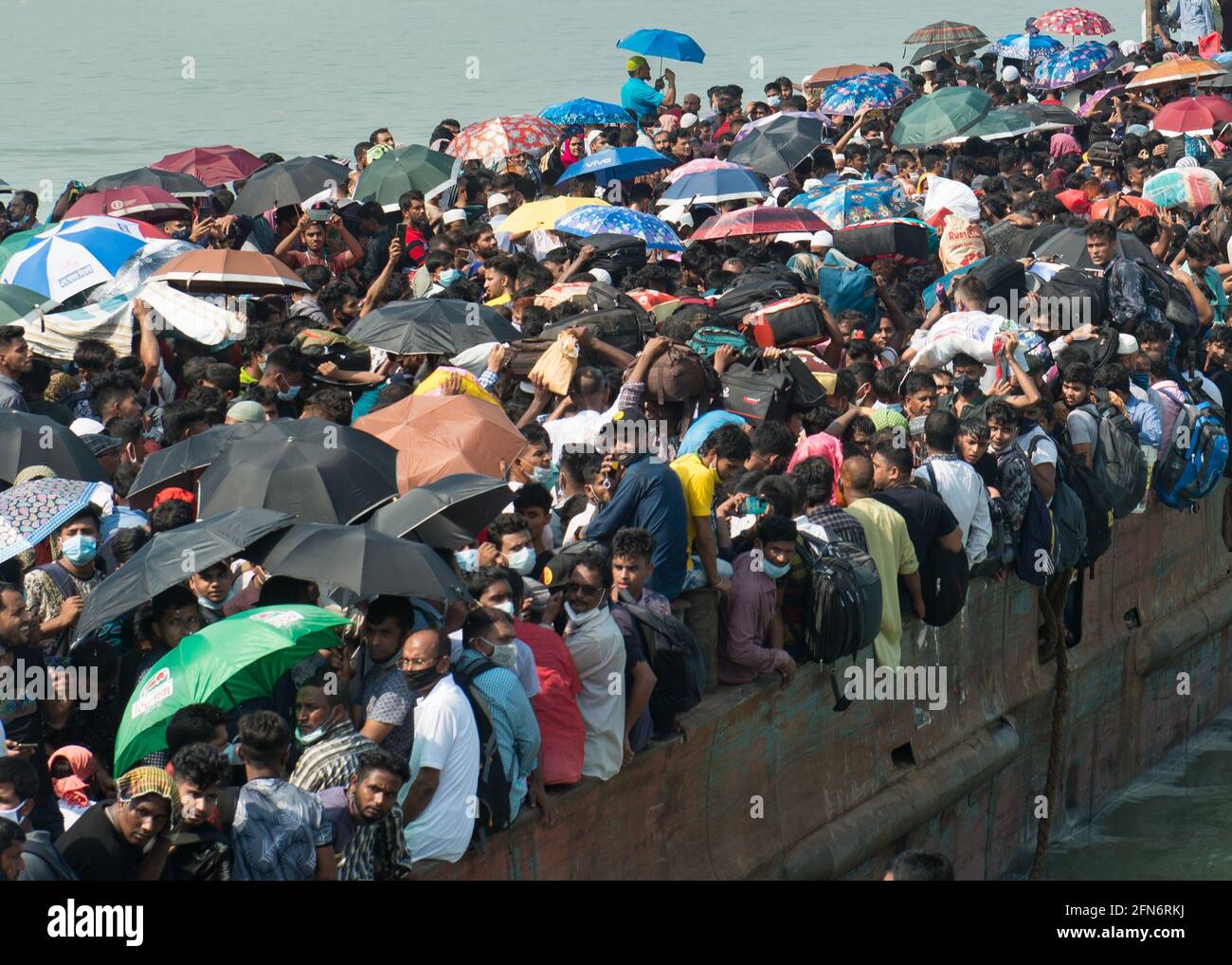 Over crowded ferry Stock Photo - Alamy