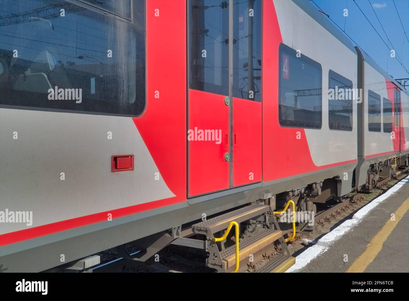 High-speed passenger electric train on the platform. High-speed train ...