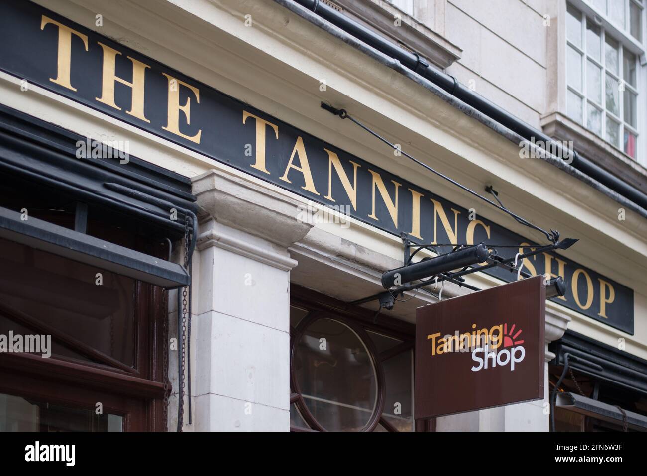 The Tanning Shop Logo Shop Sign Stock Photo - Alamy