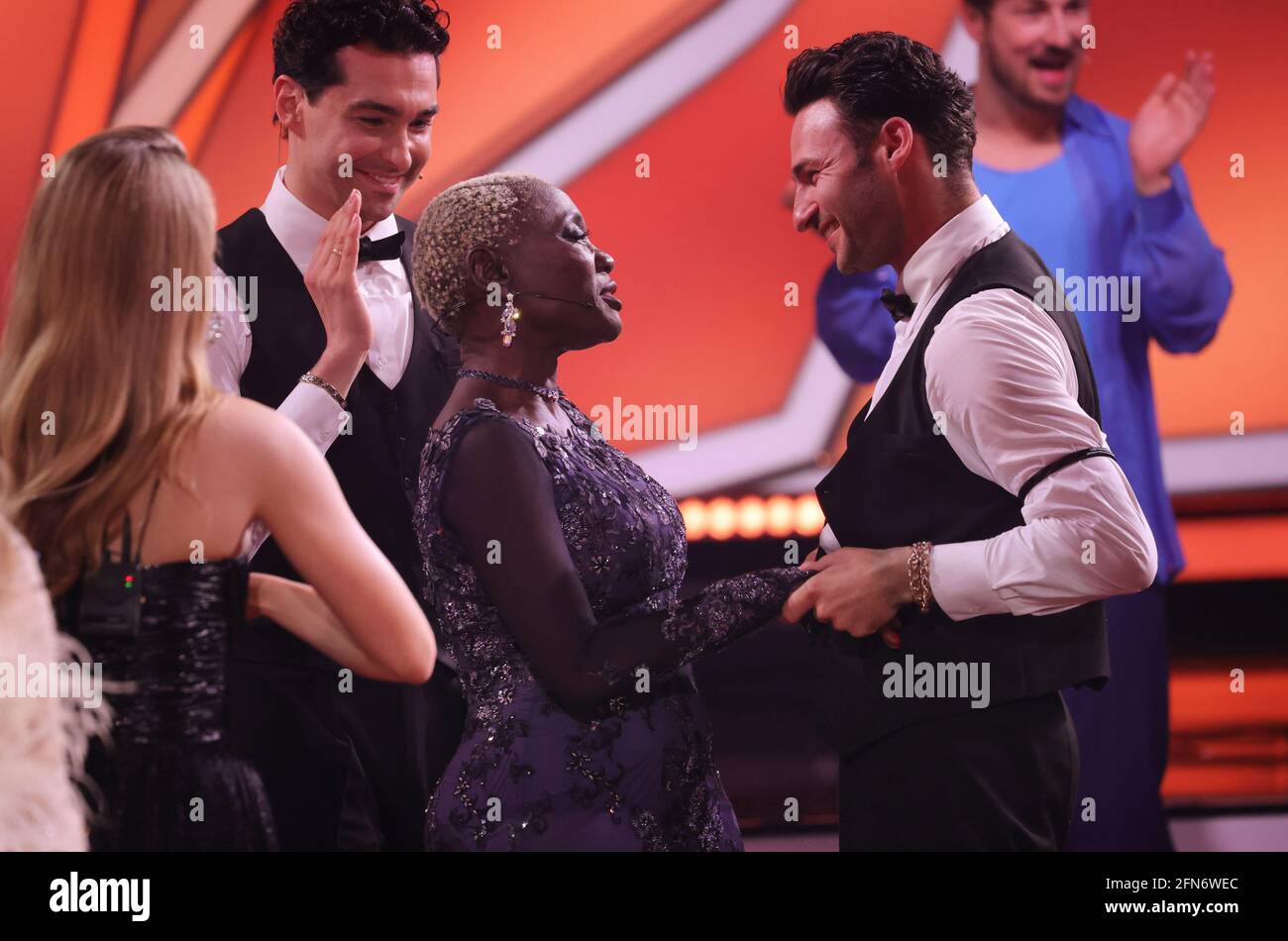 Cologne, Germany. 14th May, 2021. Auma Obama (M) and professional ...