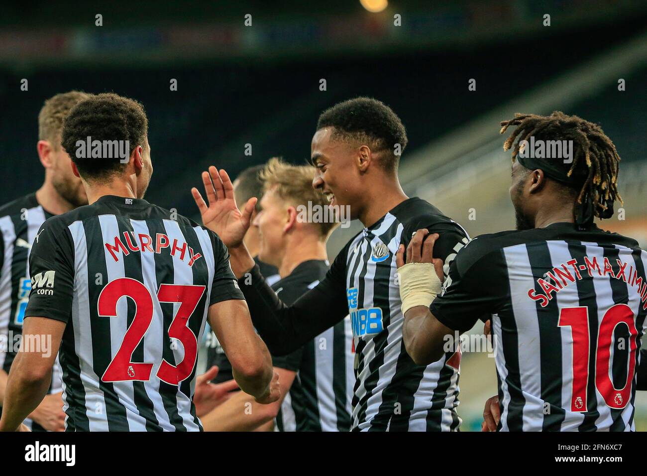 Joe Willock #28 of Newcastle United celebrates his goal with his ...