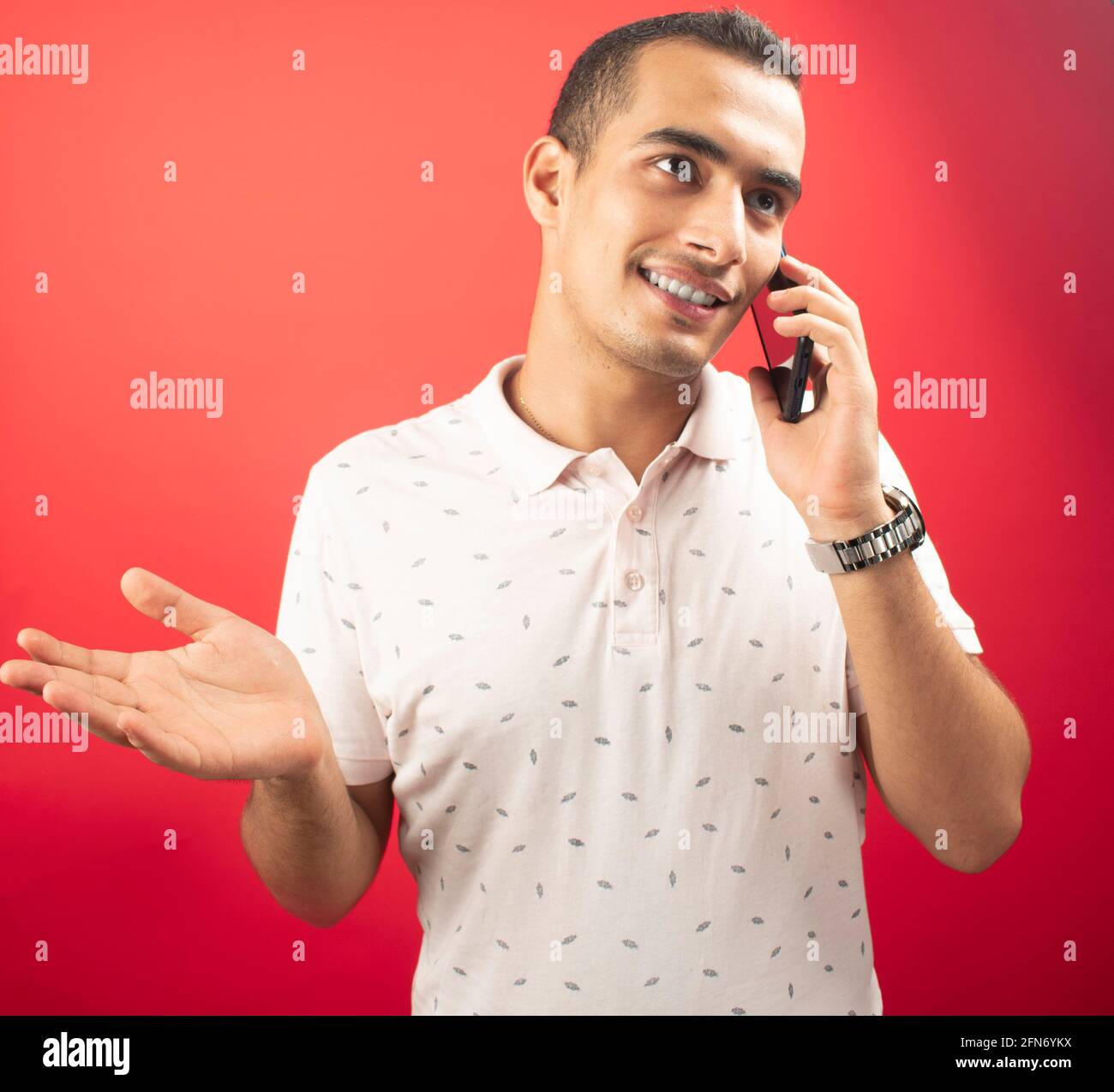 a young man making a phone call Stock Photo - Alamy