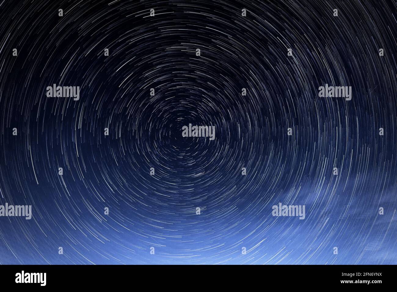 Stellar trails, the rotation of bright stars at night around the Polar ...