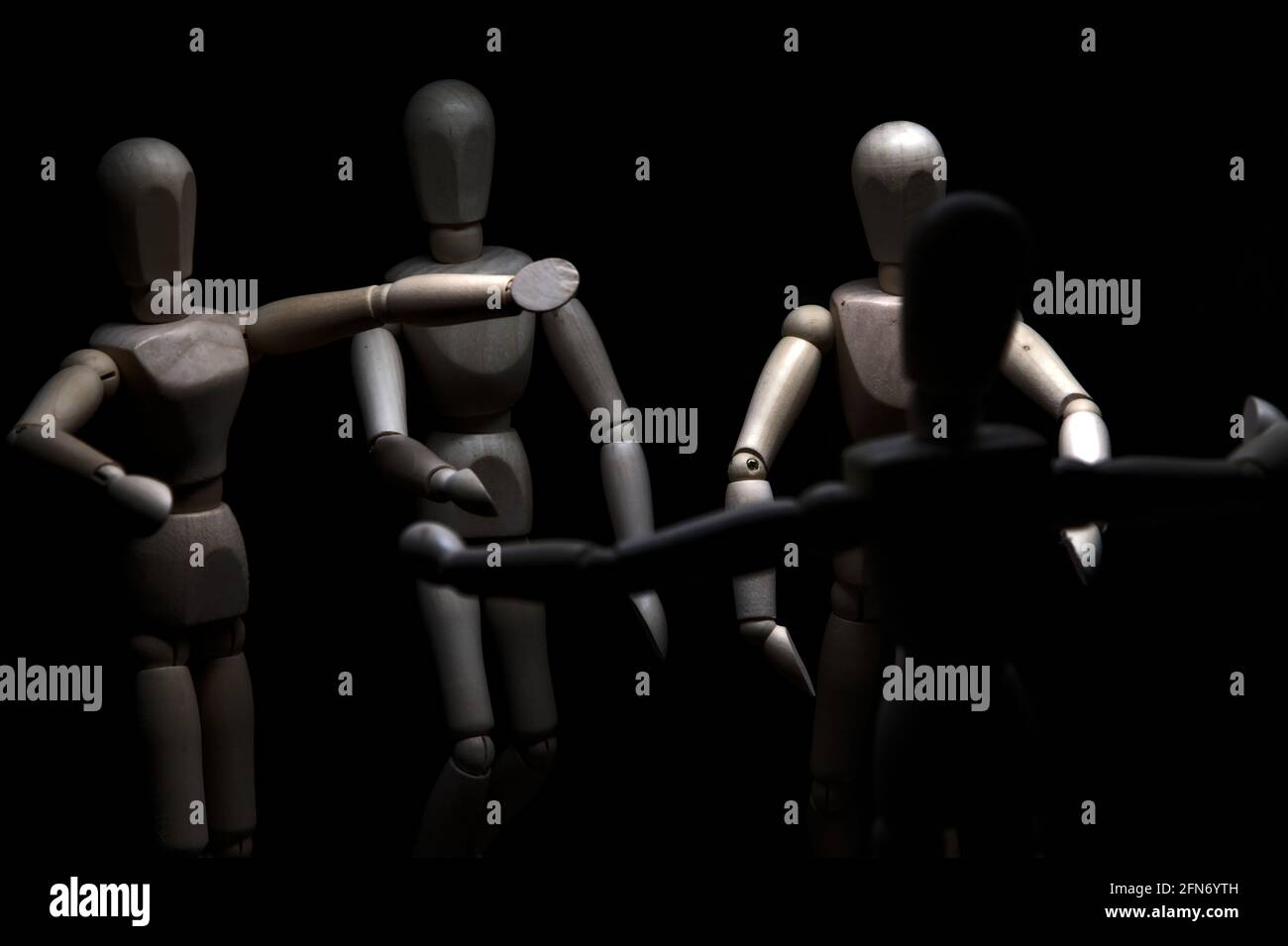 Drawing mannequins running towards one with open arms waiting for them ...