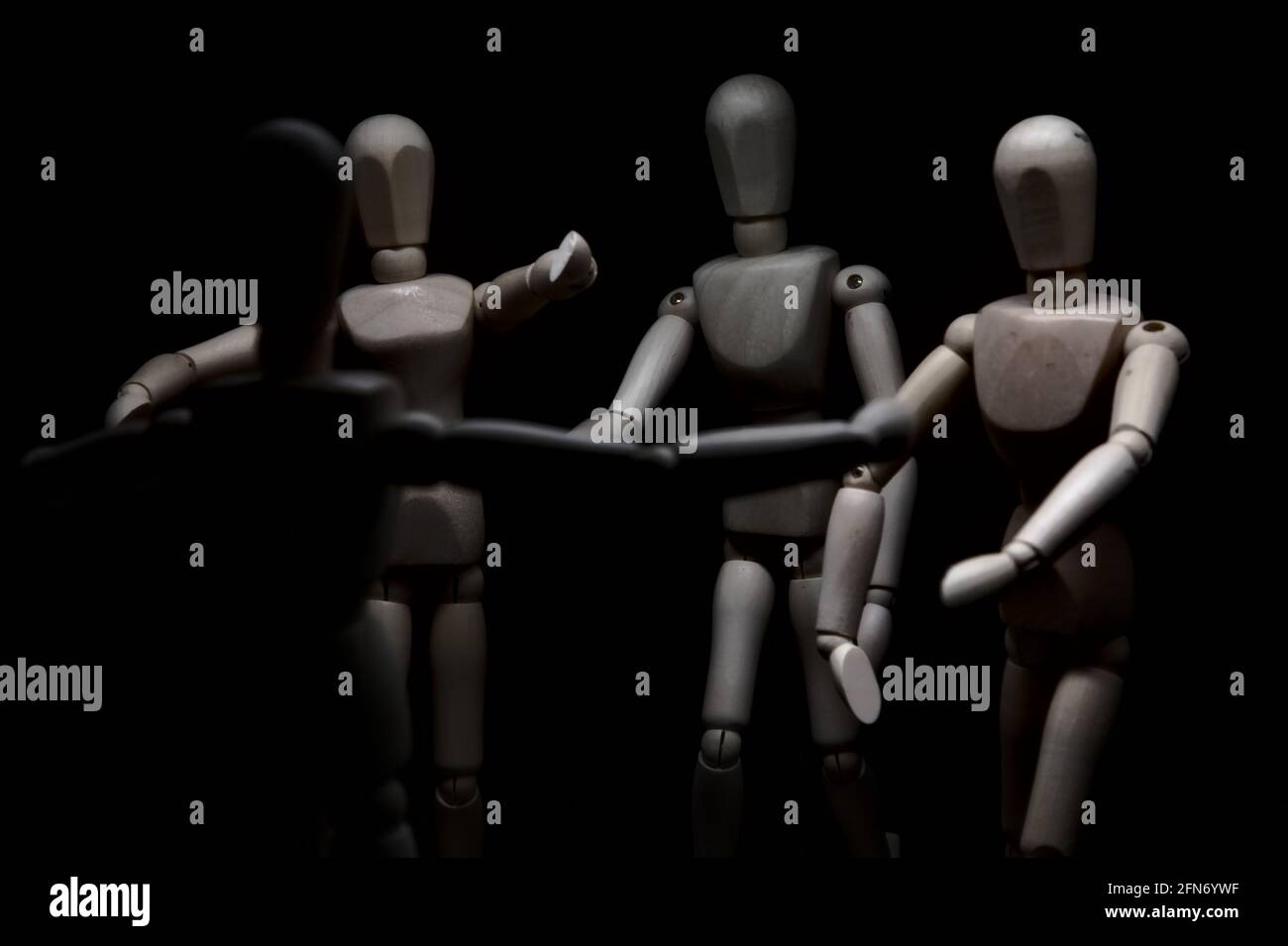 Drawing mannequins running towards one with open arms waiting for them ...