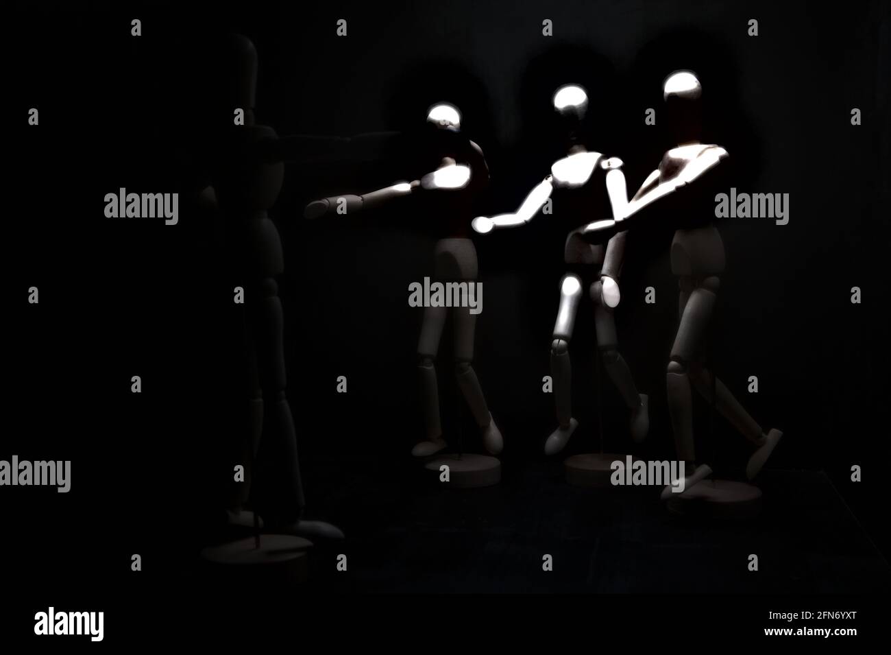 Drawing mannequins running towards one with open arms waiting for them ...