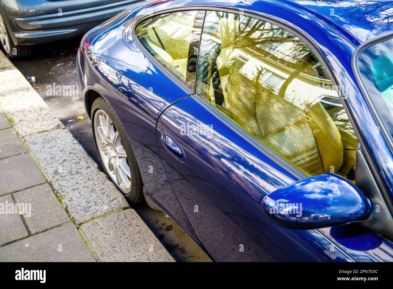 View from above of blue Porsche car with suede beige leather Stock ...