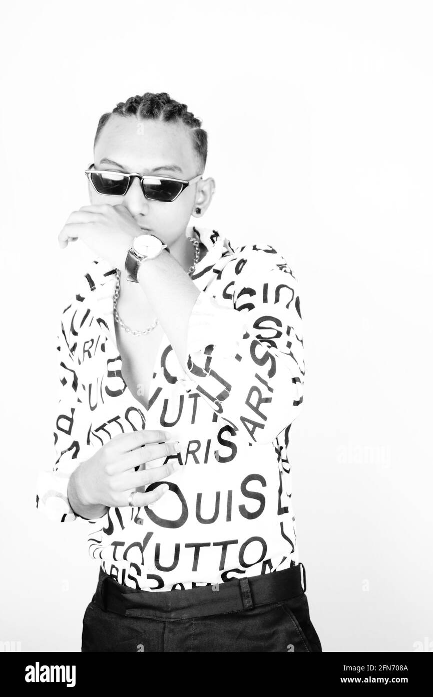 Cool and handsome man in a fashionable outfit in grayscale Stock Photo ...