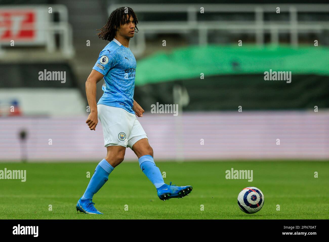 Nathan Aké #6 of Manchester City in possession of the ball Stock Photo ...