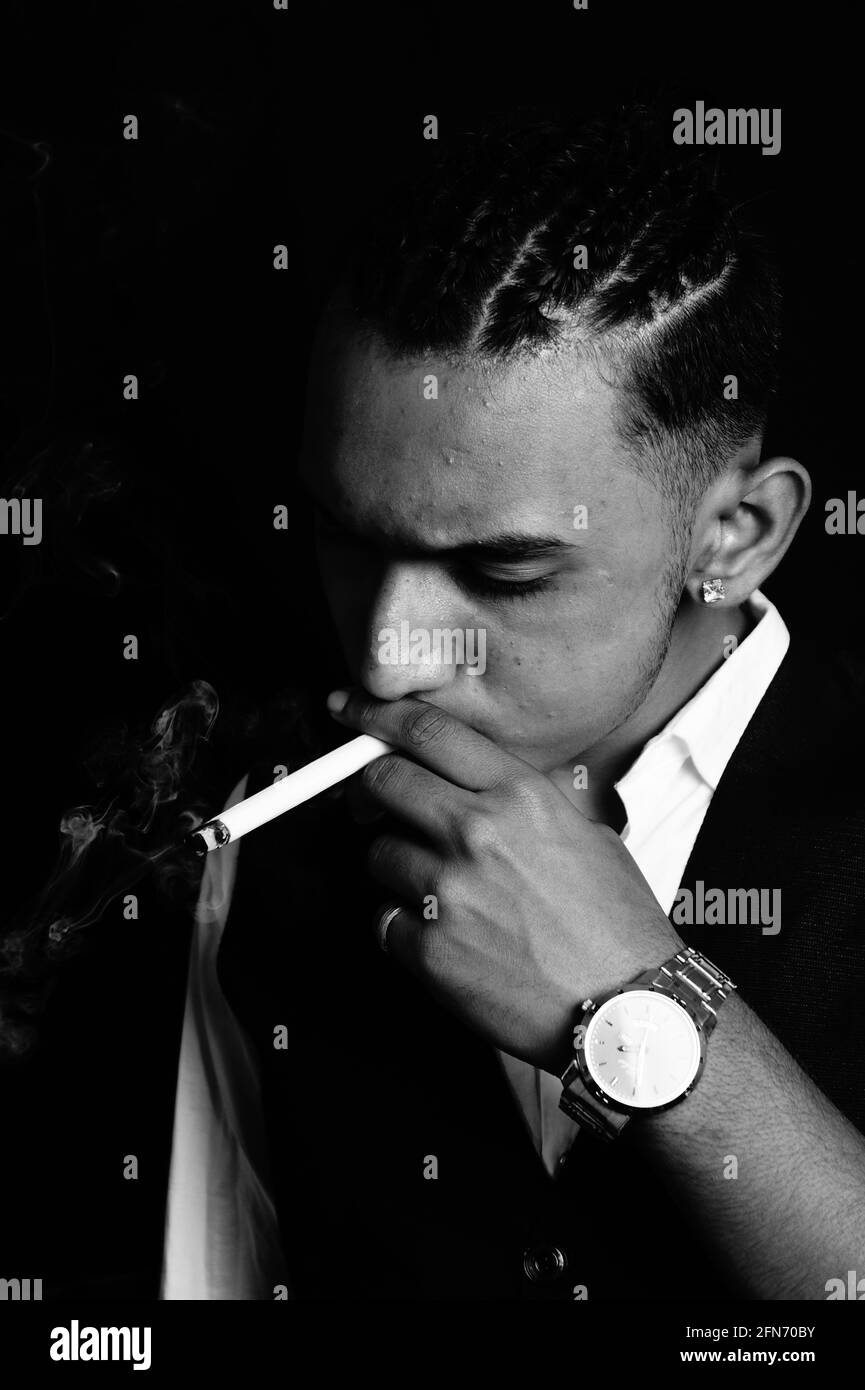 Cool and handsome mob smoking cigarette in grayscale Stock Photo - Alamy
