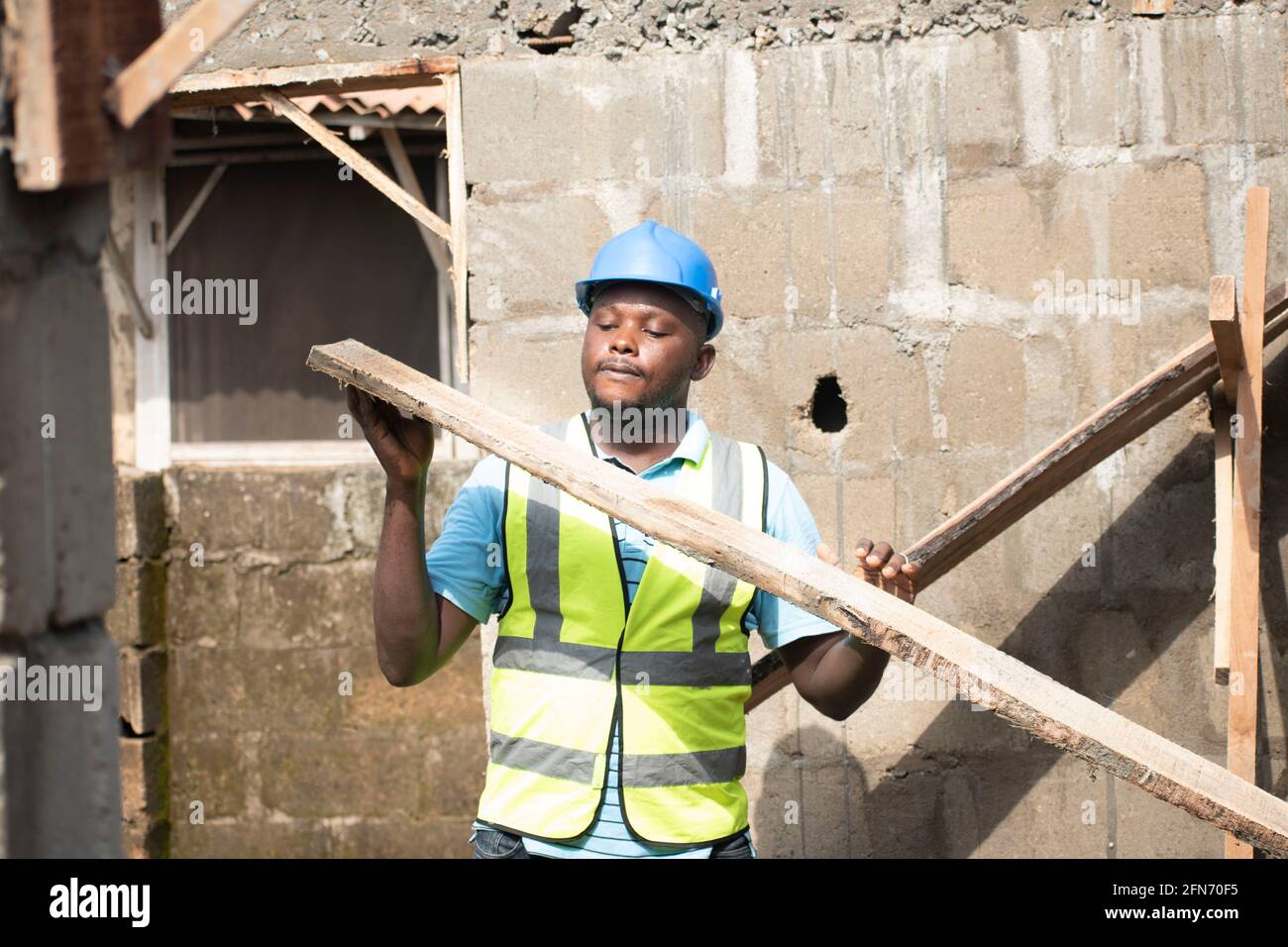Construction worker working plywood hi-res stock photography and images ...