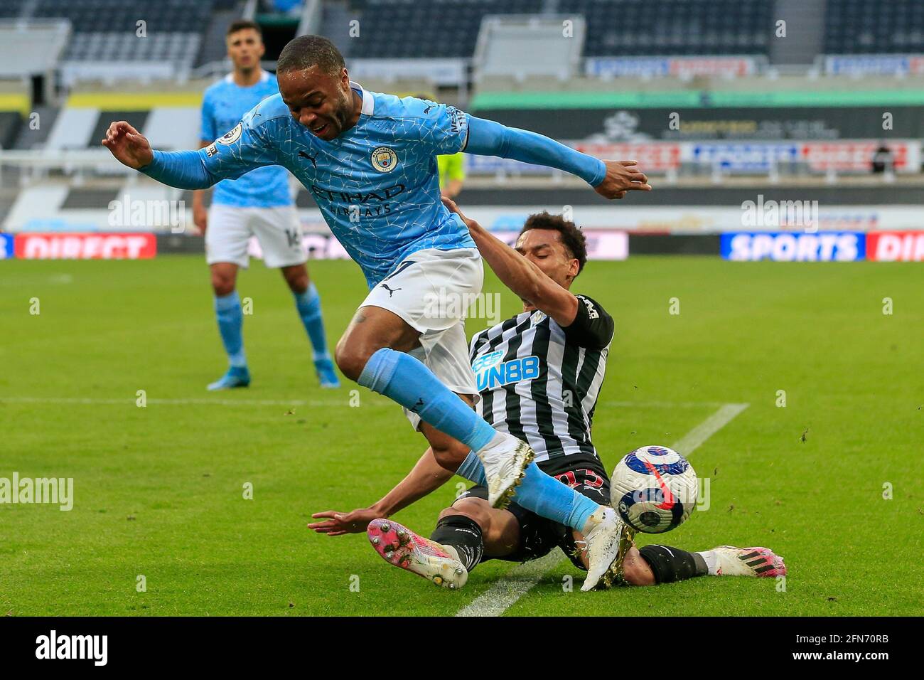 Jacob Murphy #23 of Newcastle United tackles Raheem Sterling #7 of ...