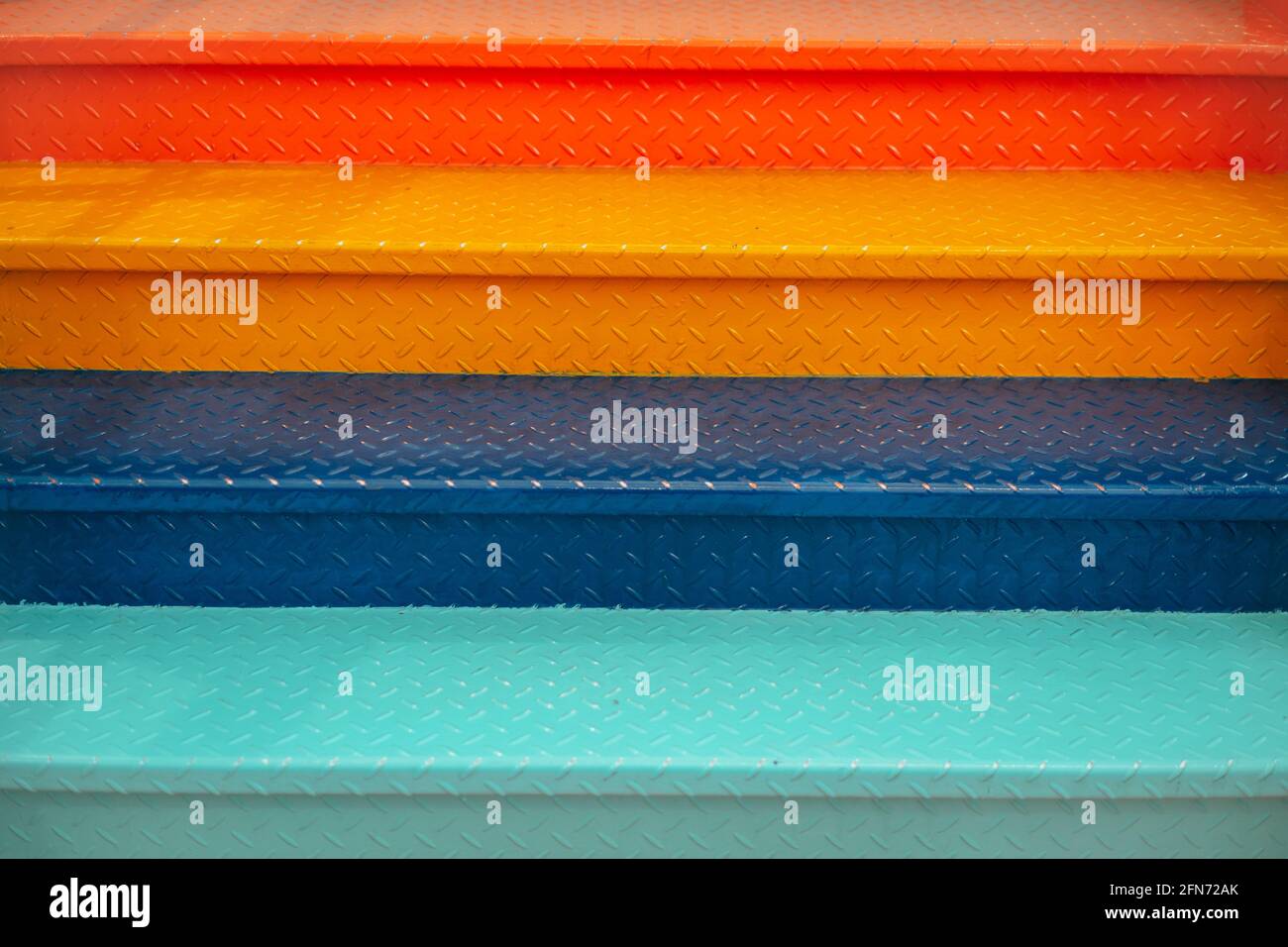 Stairs painted in bright colors, stairs background Stock Photo - Alamy