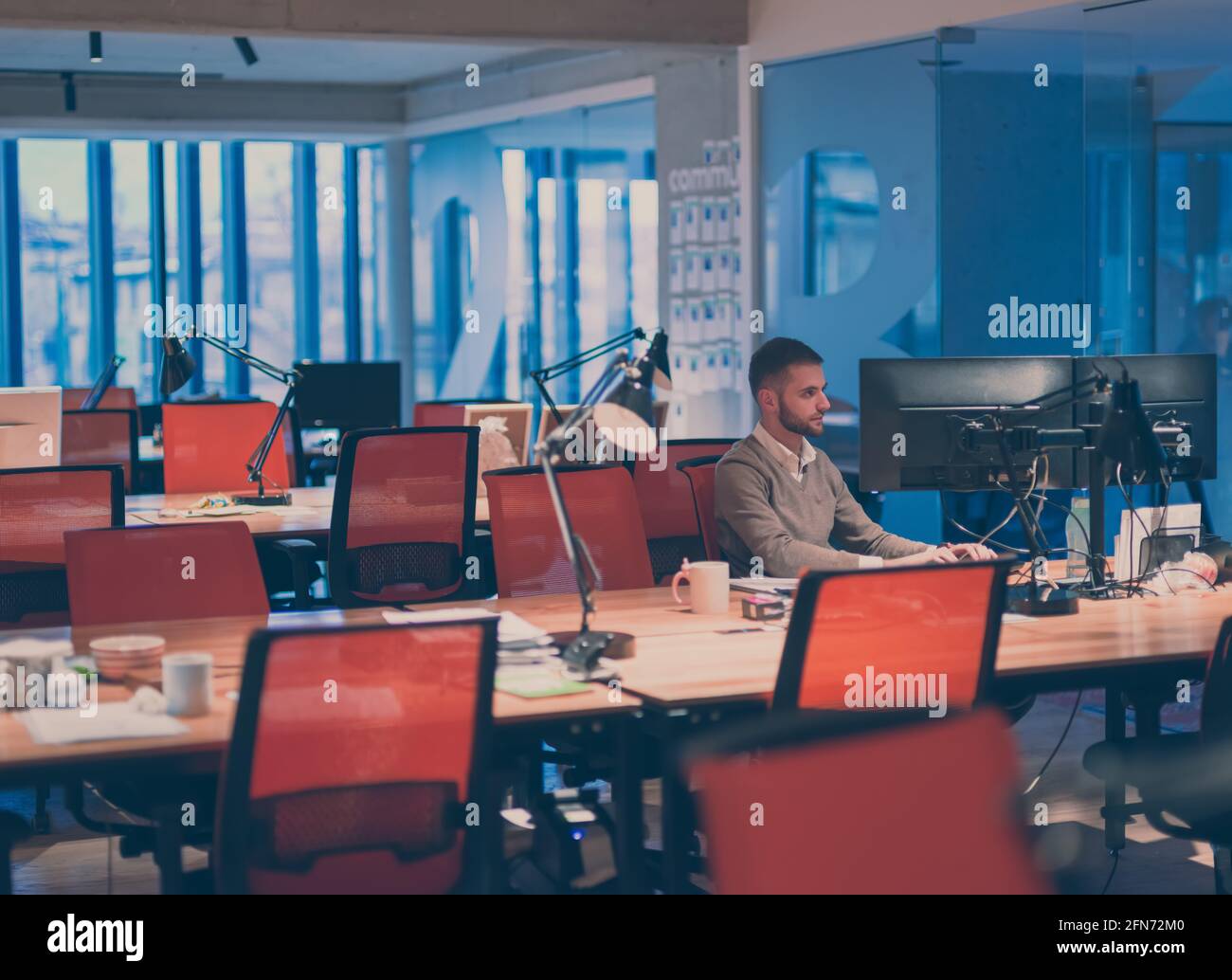 Working remotely late night hi-res stock photography and images - Alamy