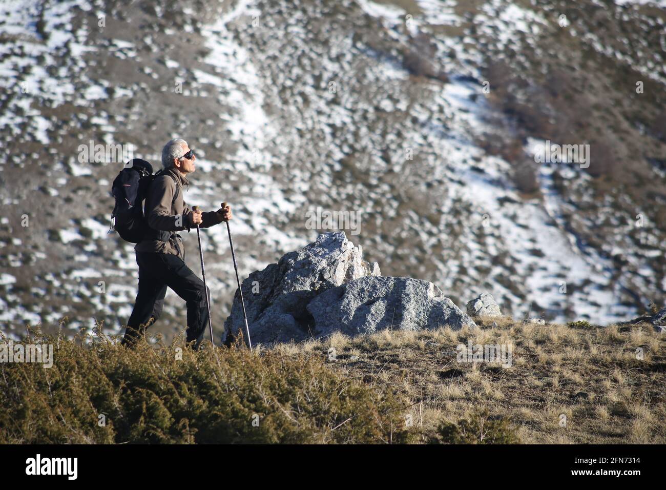 MAVROVO NATIONAL PARK, MACEDONIA - DECEMBER 20: Mountaineer hiking at ...