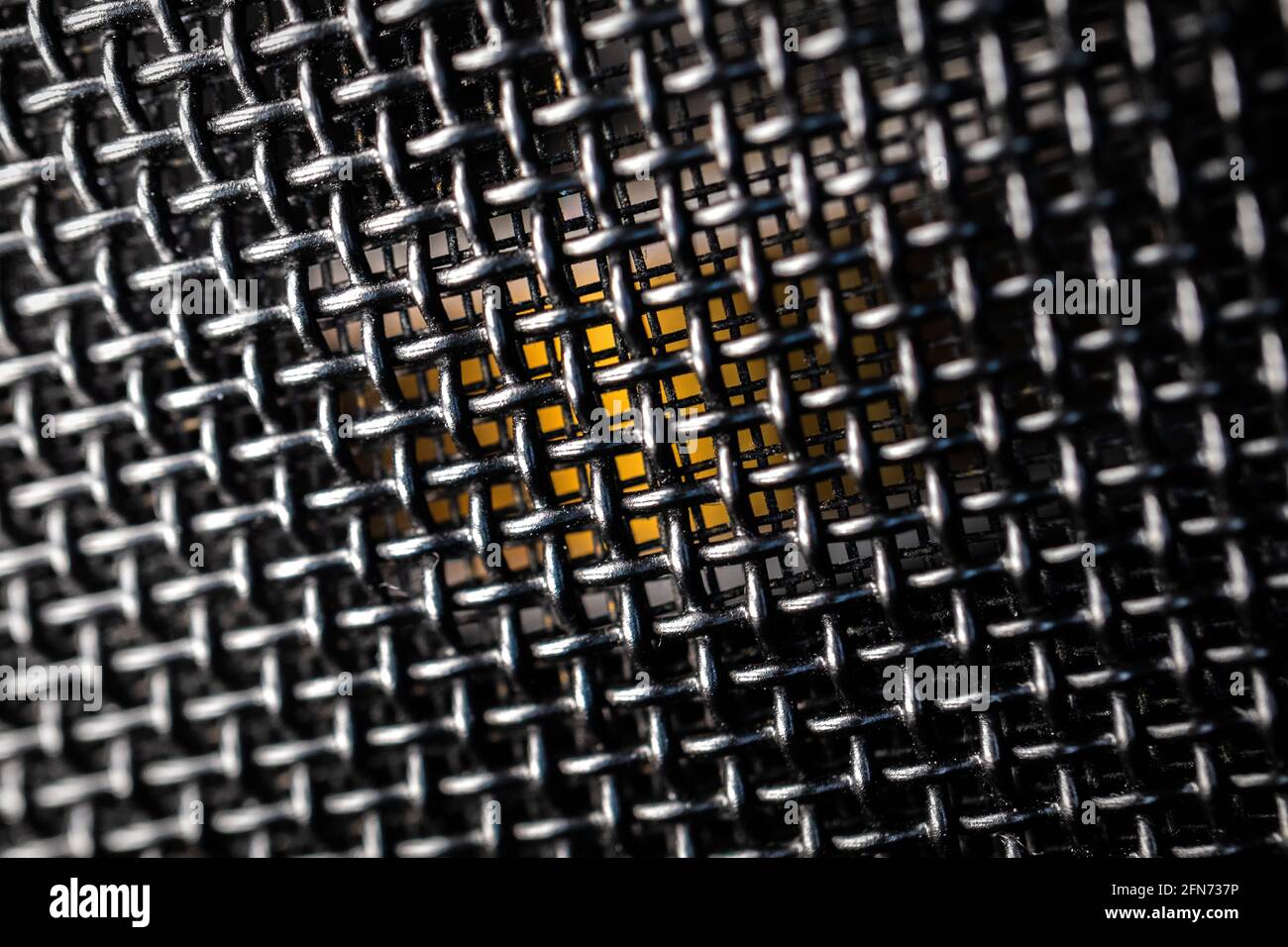 Macro photo of large diaphragm condenser microphone grill with copper ...