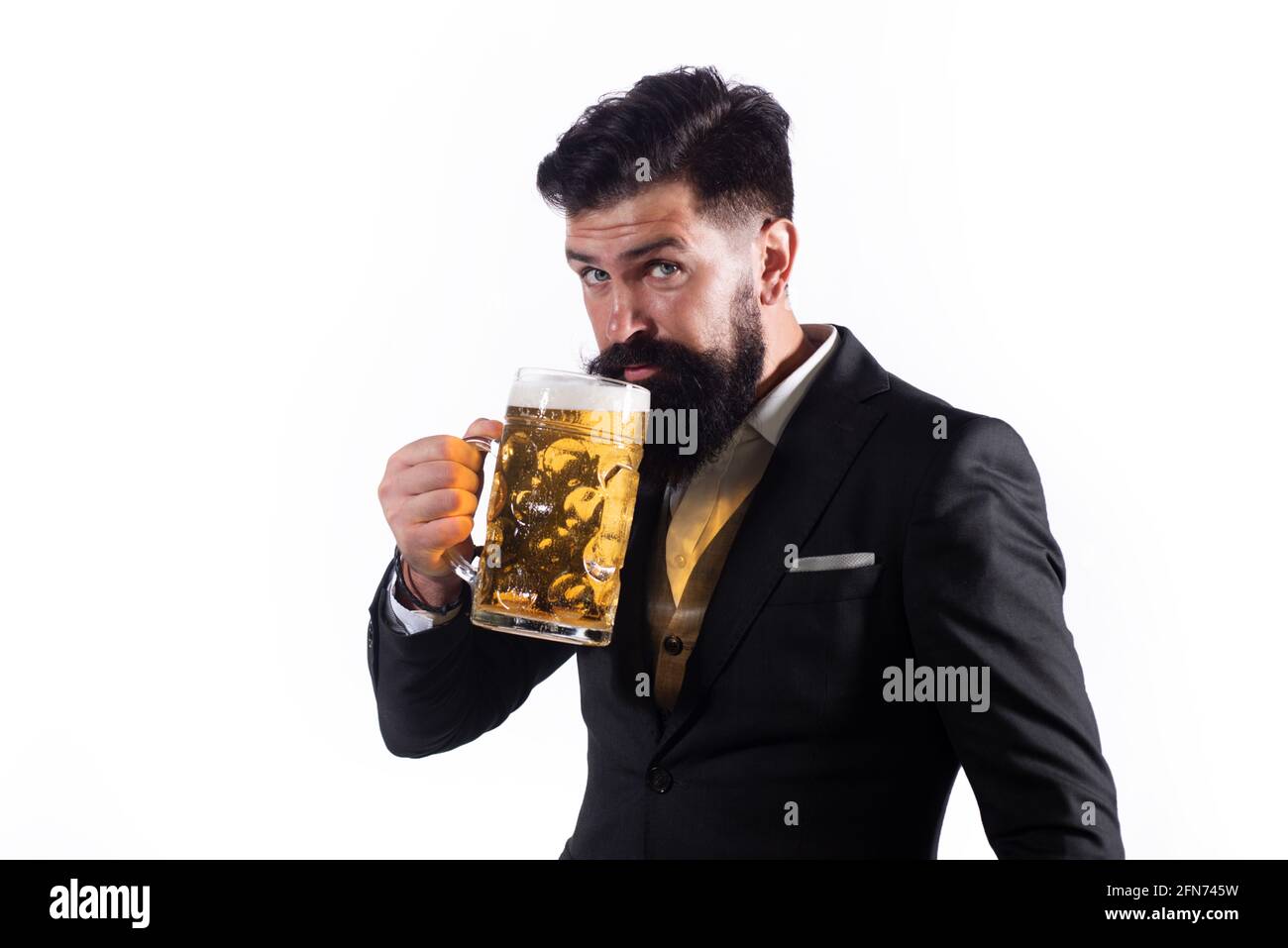 Portrait of handsome bearded man tasting a craft beer. Stylish handsome ...