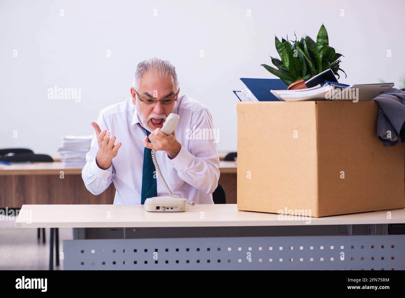 Old employee being fired from his work Stock Photo - Alamy