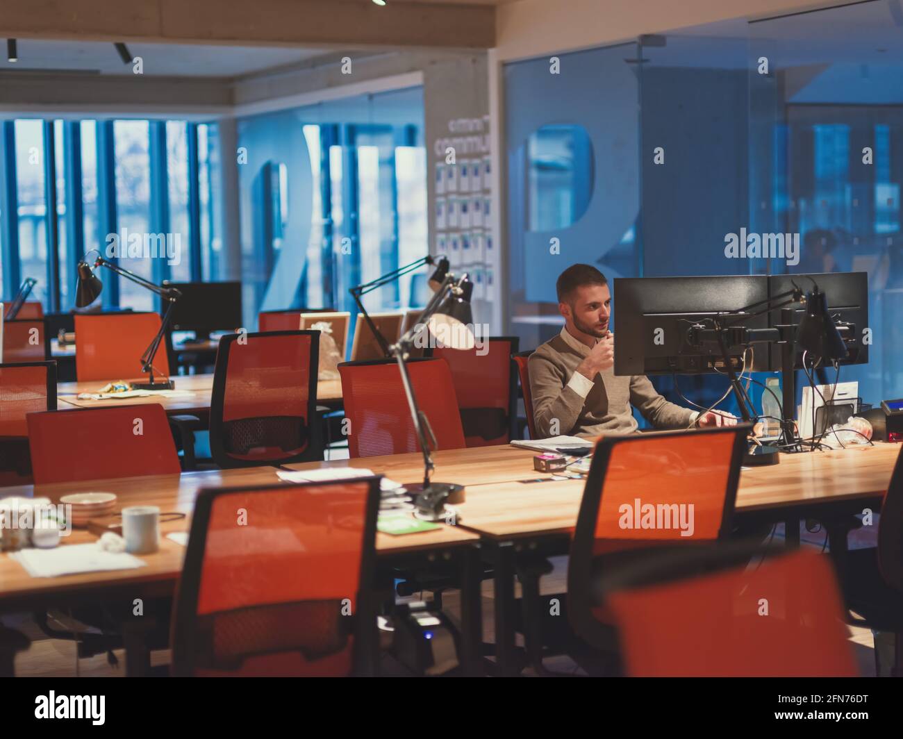 Working remotely late night hi-res stock photography and images - Alamy