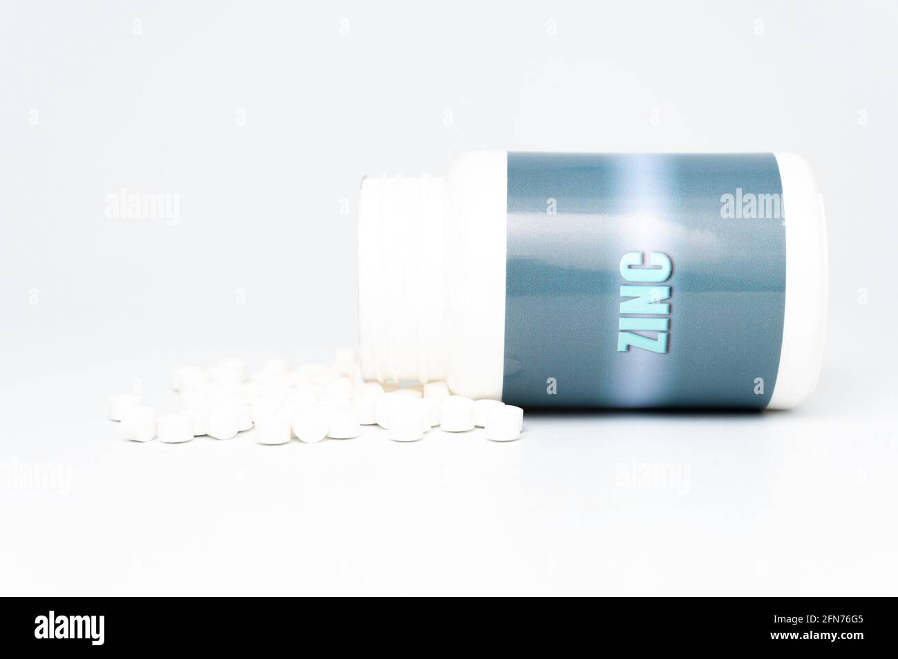 Medical concept - Plastic bottle of Zinc mineral supplement with ...