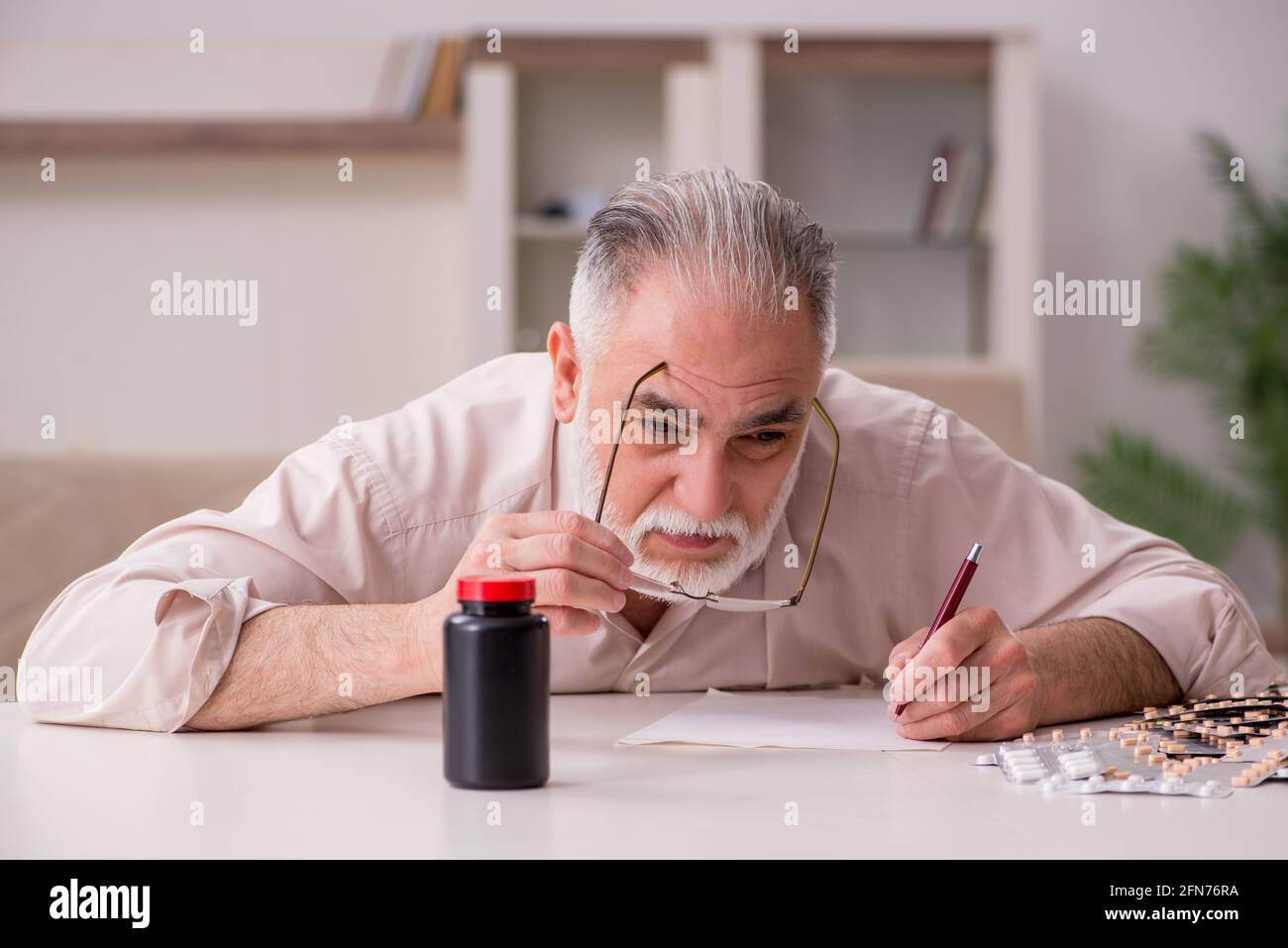 Old man writing last will hi-res stock photography and images - Alamy