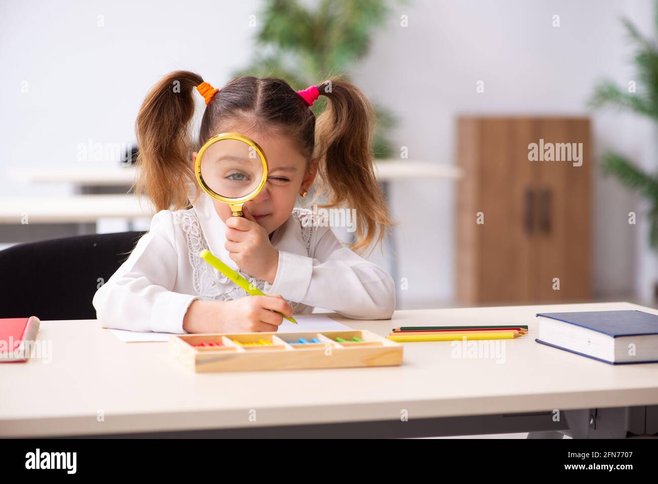 Small girl in the early development concept Stock Photo - Alamy