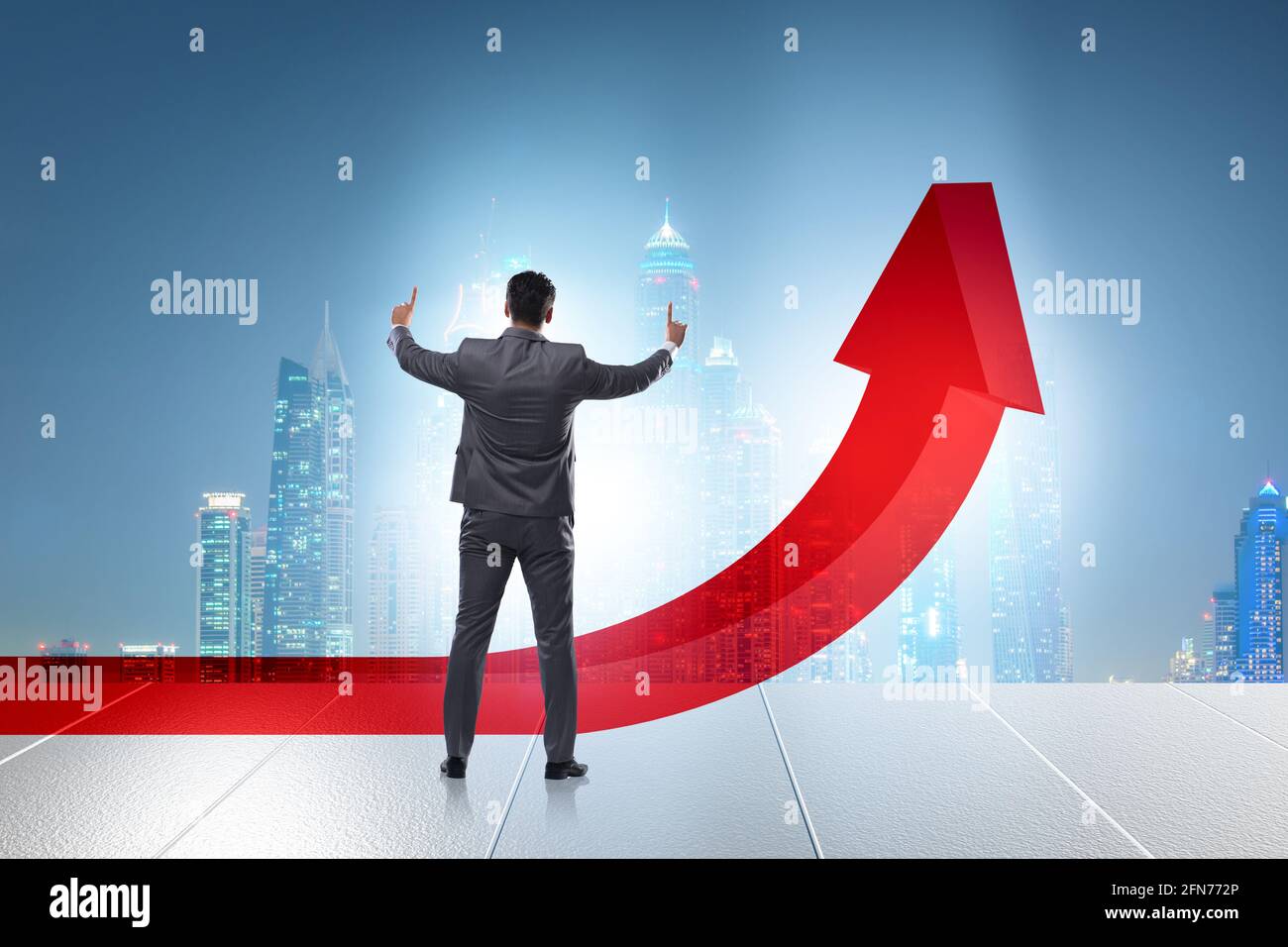 Businessman in the economic growth concept Stock Photo - Alamy