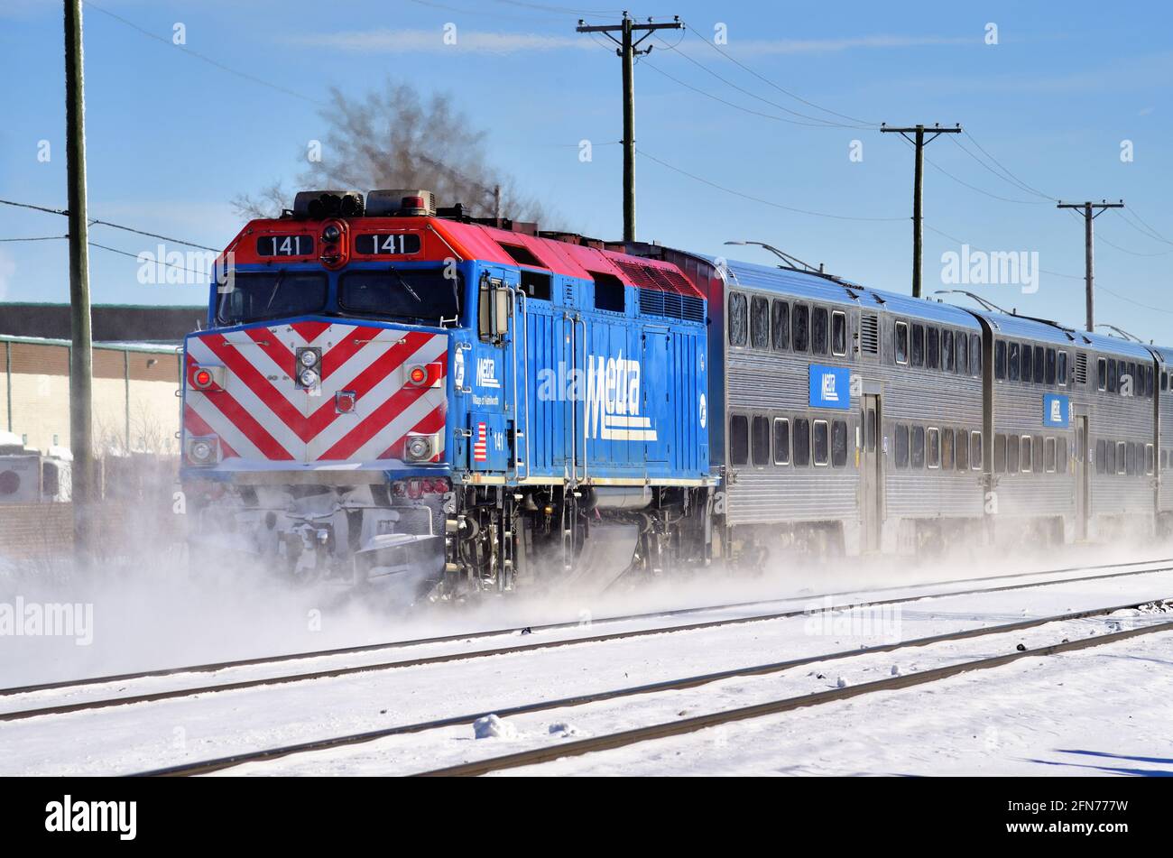 Berkeley, Illinois, USA. A Metra locomotive and commuter train disturb ...