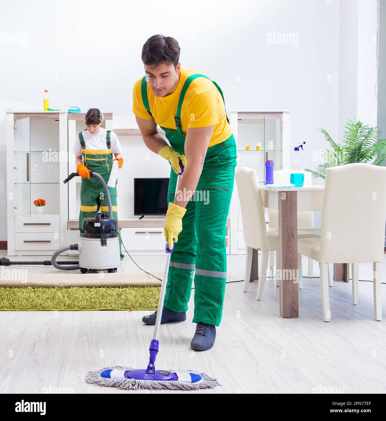 The cleaning professional contractors working at house Stock Photo - Alamy