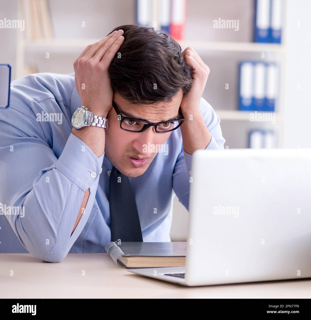 The extremely busy businessman working in office Stock Photo - Alamy
