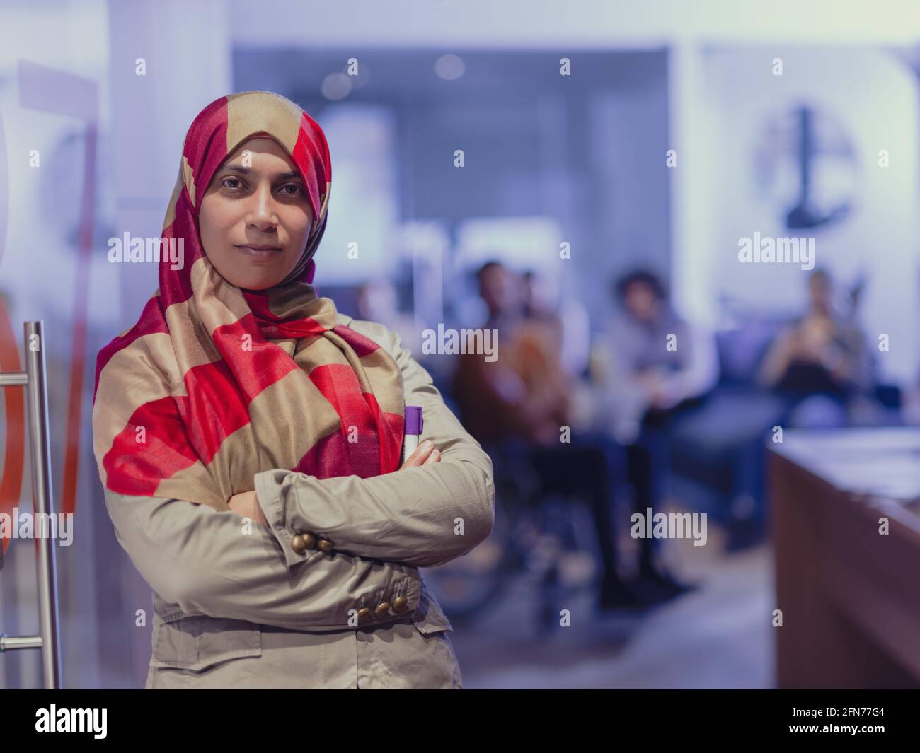 Muslim woman wearing hijab in office, Arabic business woman covered ...