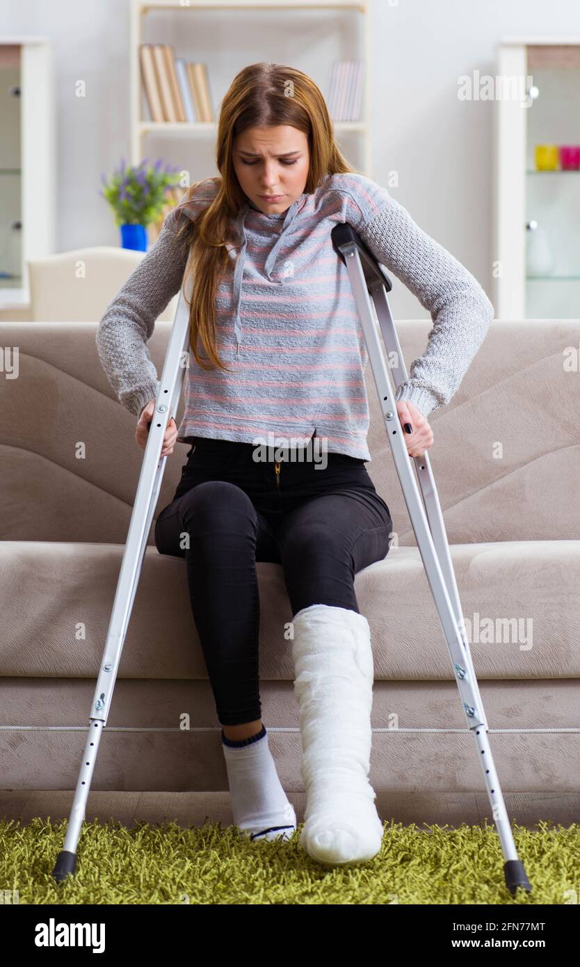 The young woman with broken leg at home Stock Photo - Alamy