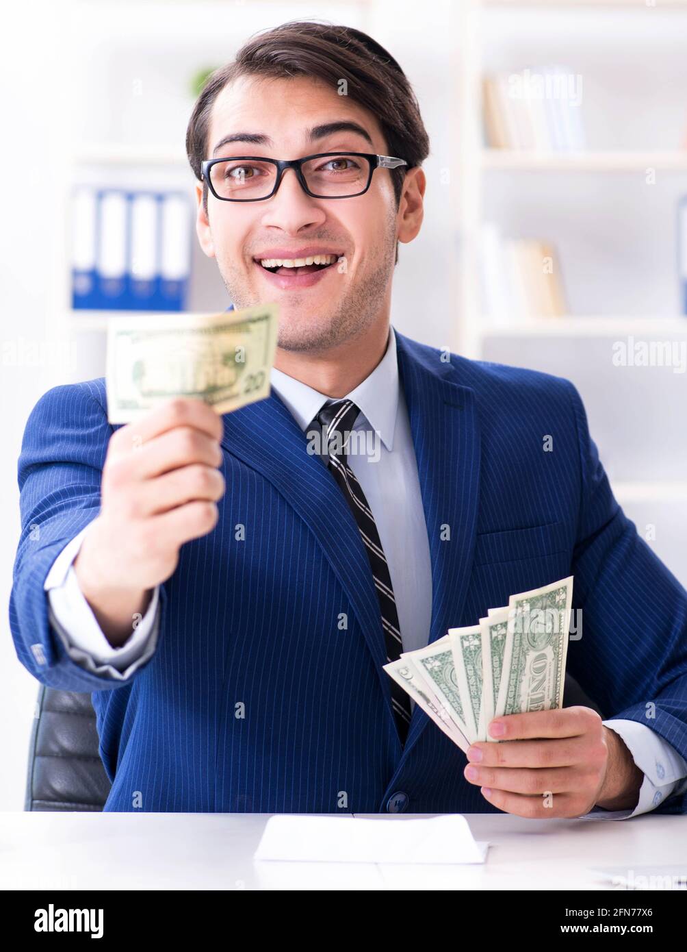 The businessman receiving his salary and bonus Stock Photo - Alamy