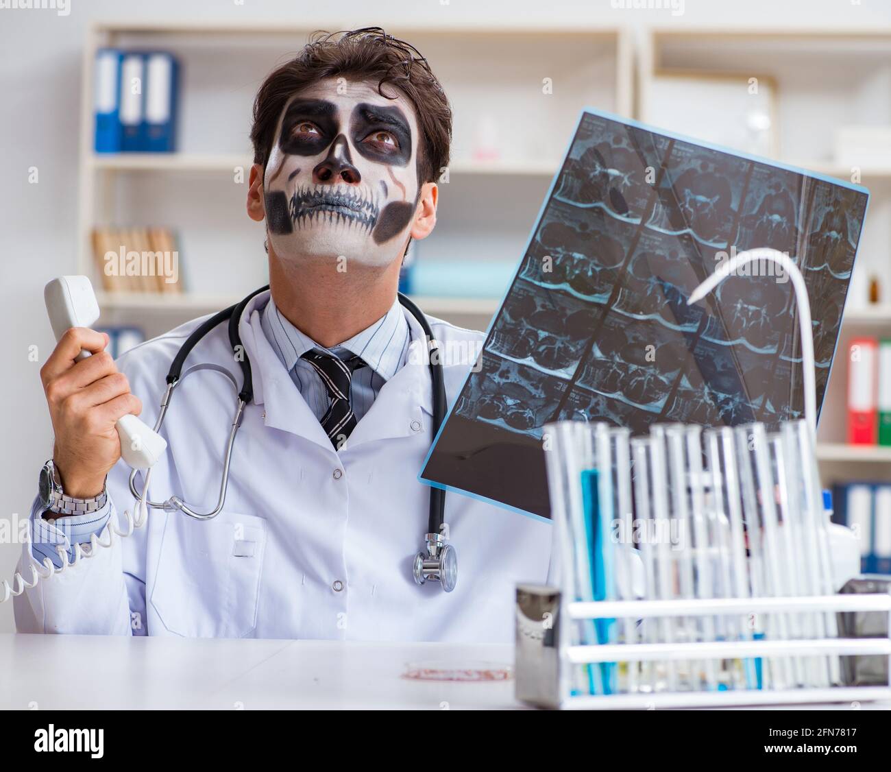 The scary monster doctor working in lab Stock Photo - Alamy