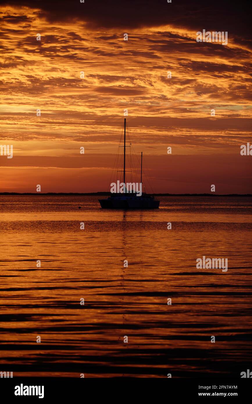 Summer cruise. Sailboats at sunset. Ocean yacht sailing along water ...