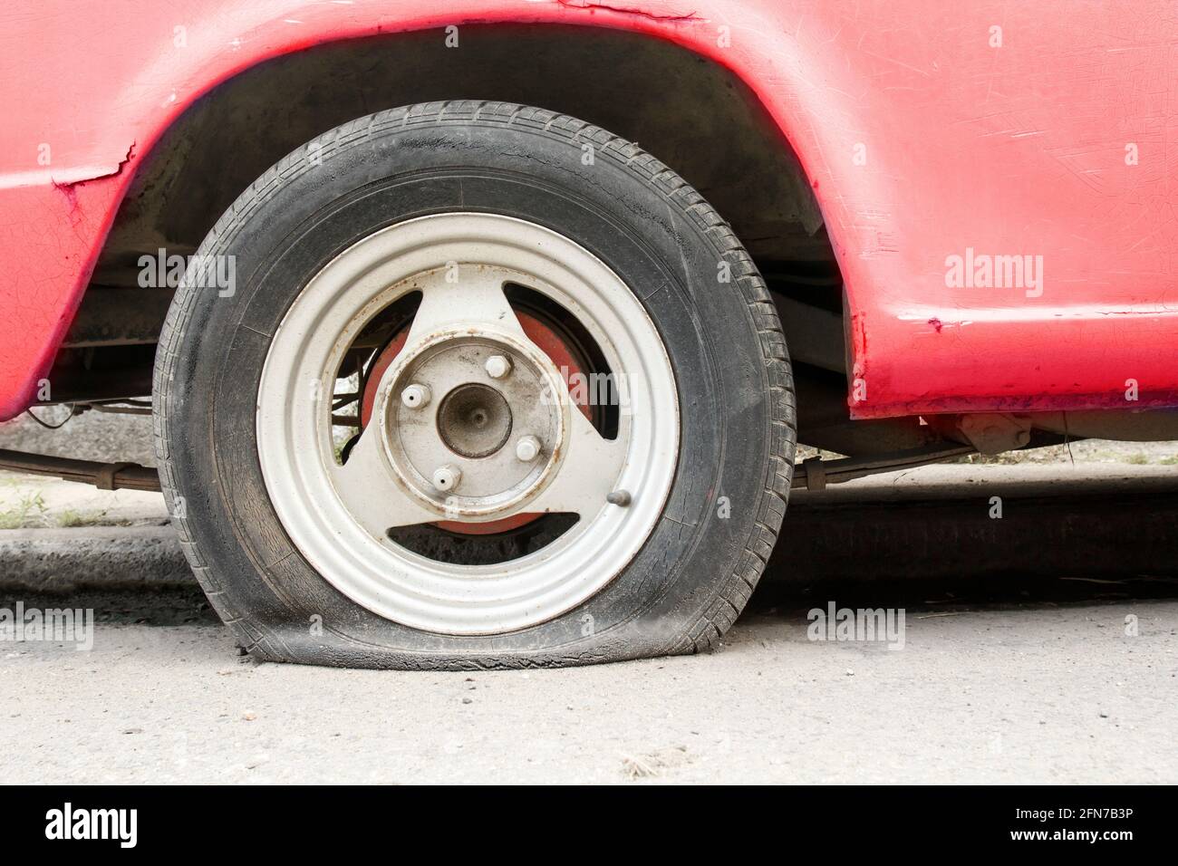Car flat tire hi-res stock photography and images - Alamy