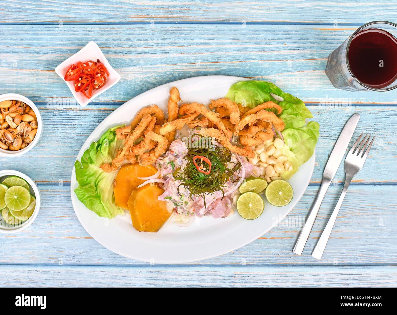 Peruvian food: fish ceviche and chicharron de pescado with fried ...