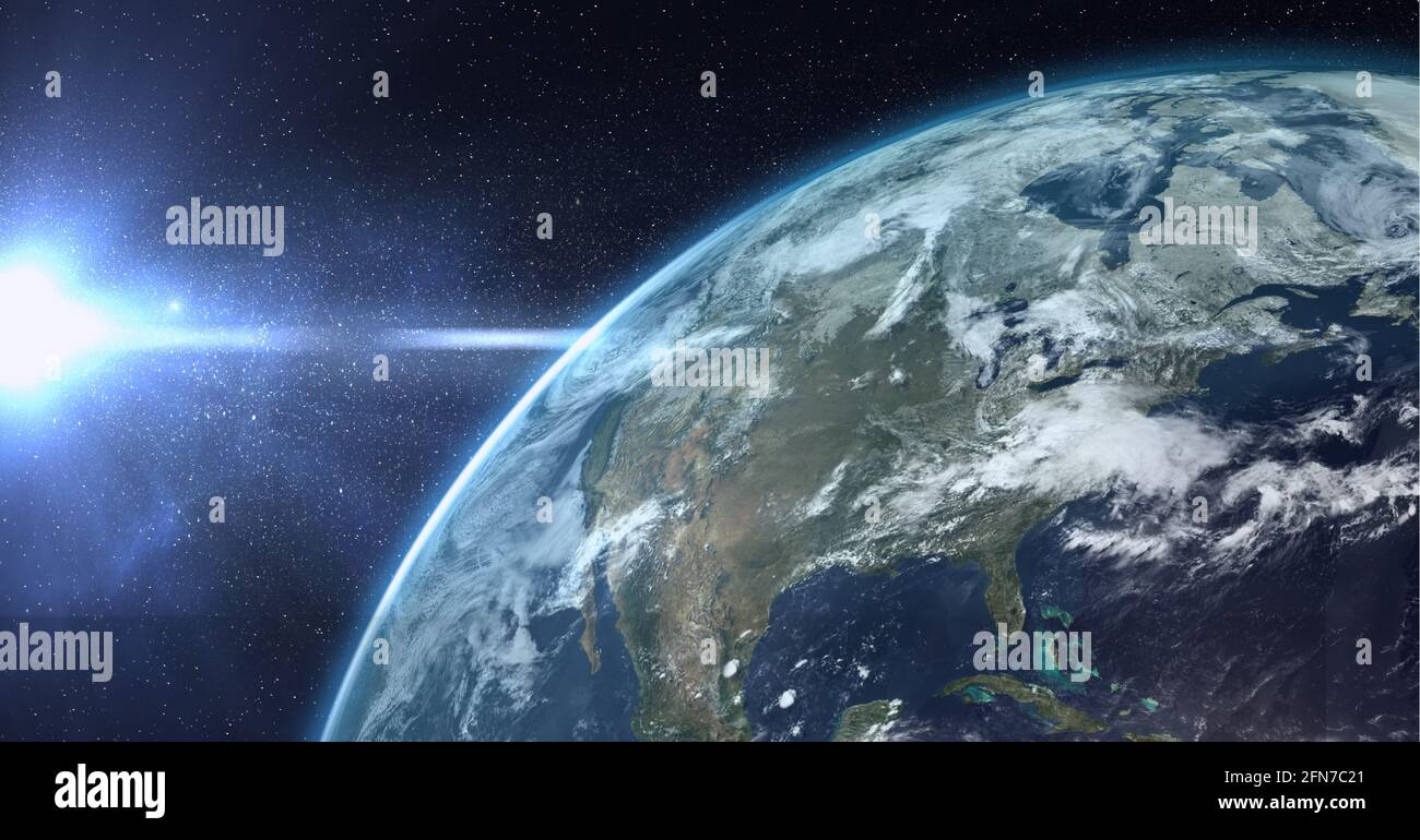 Digitally generated image of globe against spot of blue light in space ...