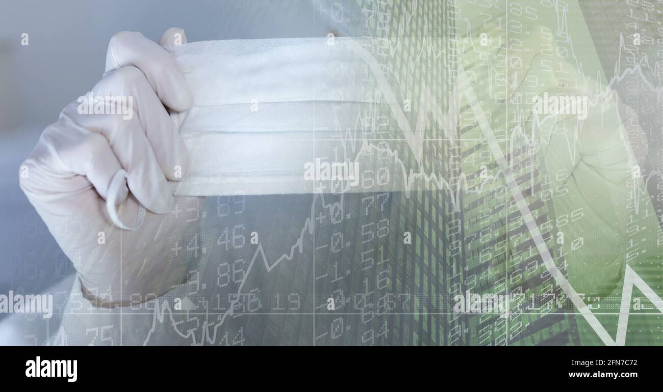 Composition of medical data processing over doctor holding face mask ...