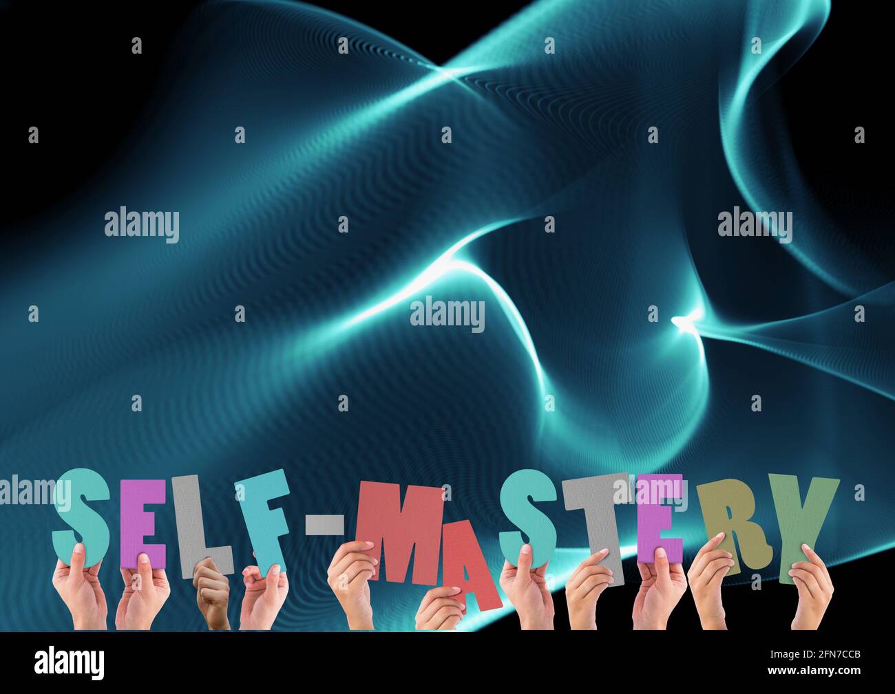 Composition of self mastery text in multi coloured letters held by ...