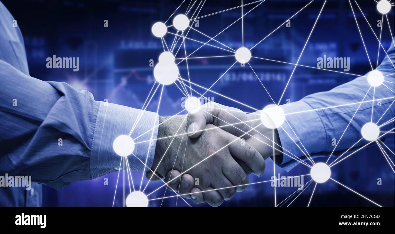 Network of connections over mid section of two businessmen shaking ...