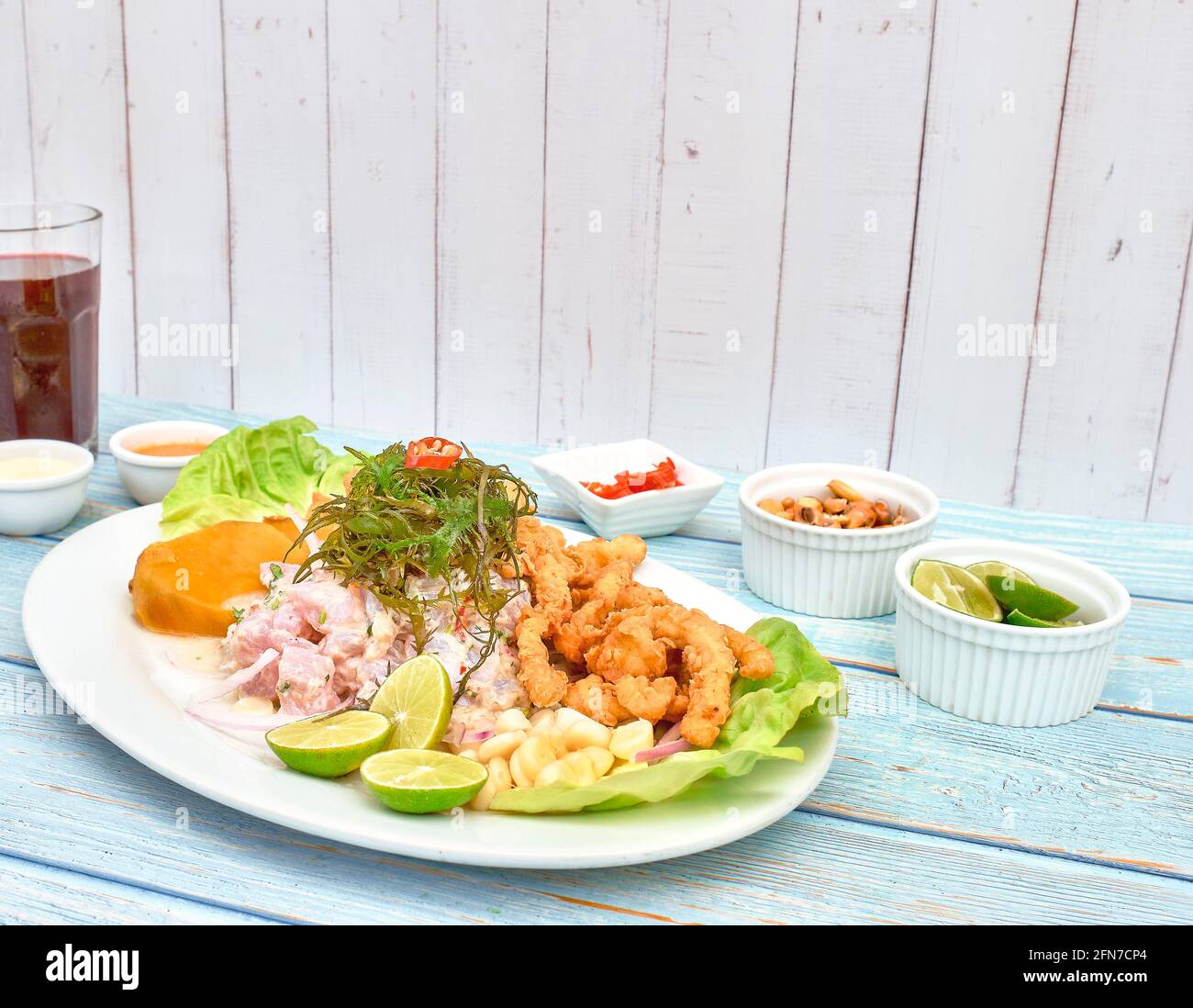 Peruvian food: fish ceviche and chicharron de pescado with fried ...