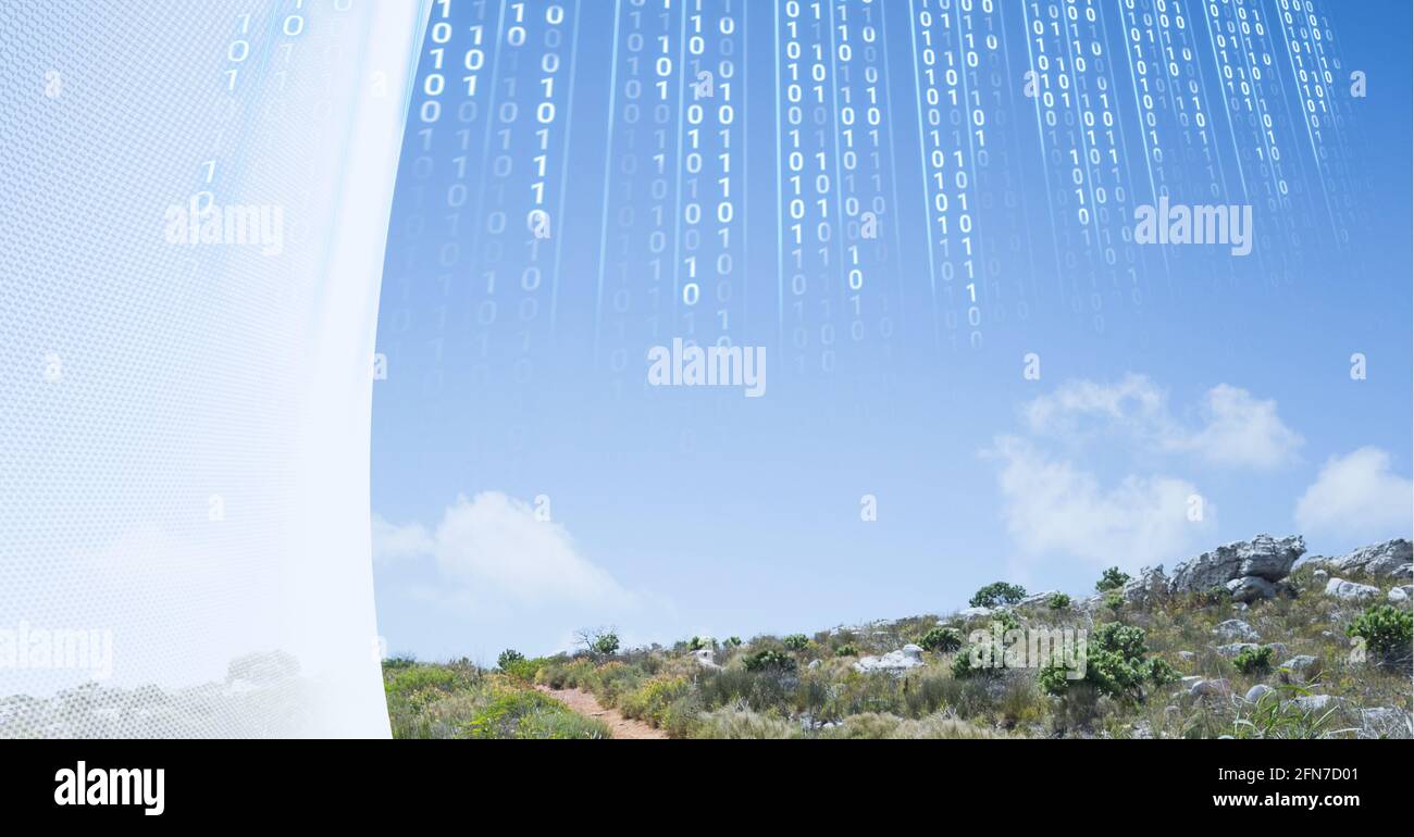 Composition of binary coding over sunny landscape Stock Photo - Alamy