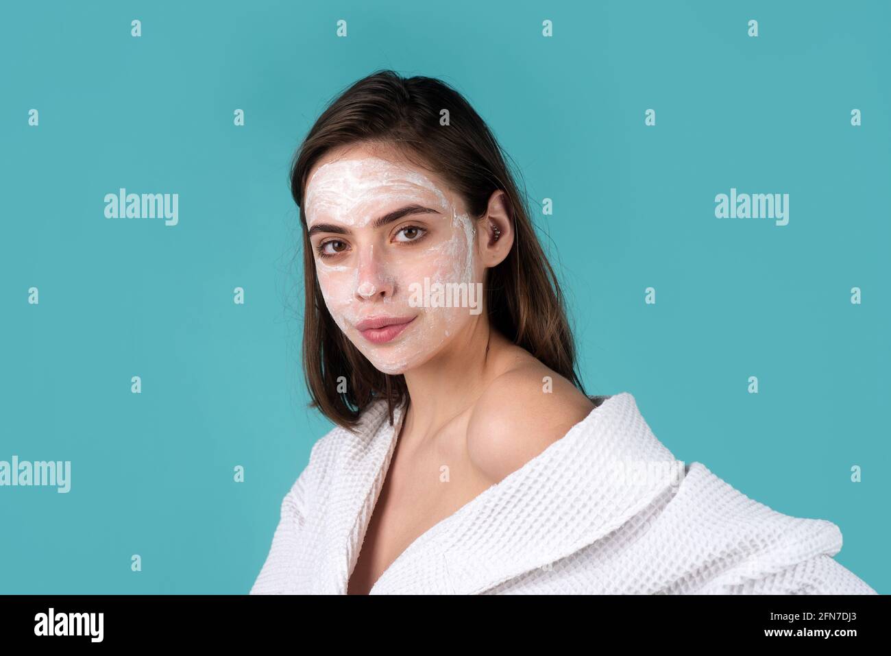 Woman beauty face, portrait of beautiful female model with facial mask ...