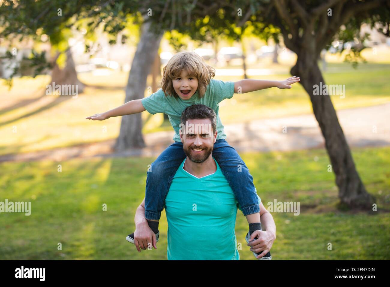 Shoulder ride hi-res stock photography and images - Alamy
