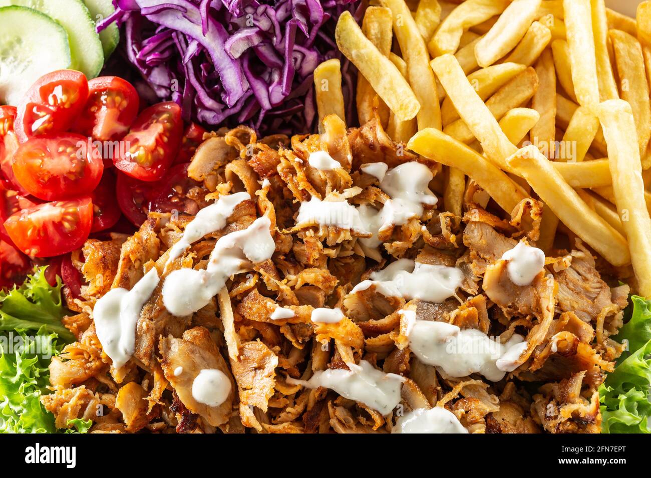 Top view closeup of Turkish grilled kebab with homegrown vegetables ...