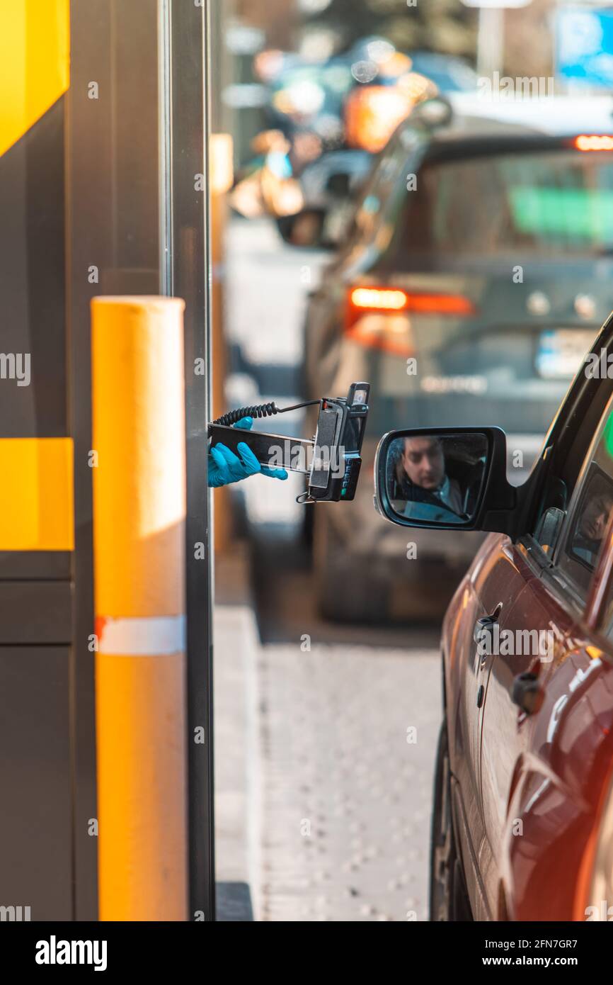 paying for fast food from the car at drive-through close up Stock Photo ...