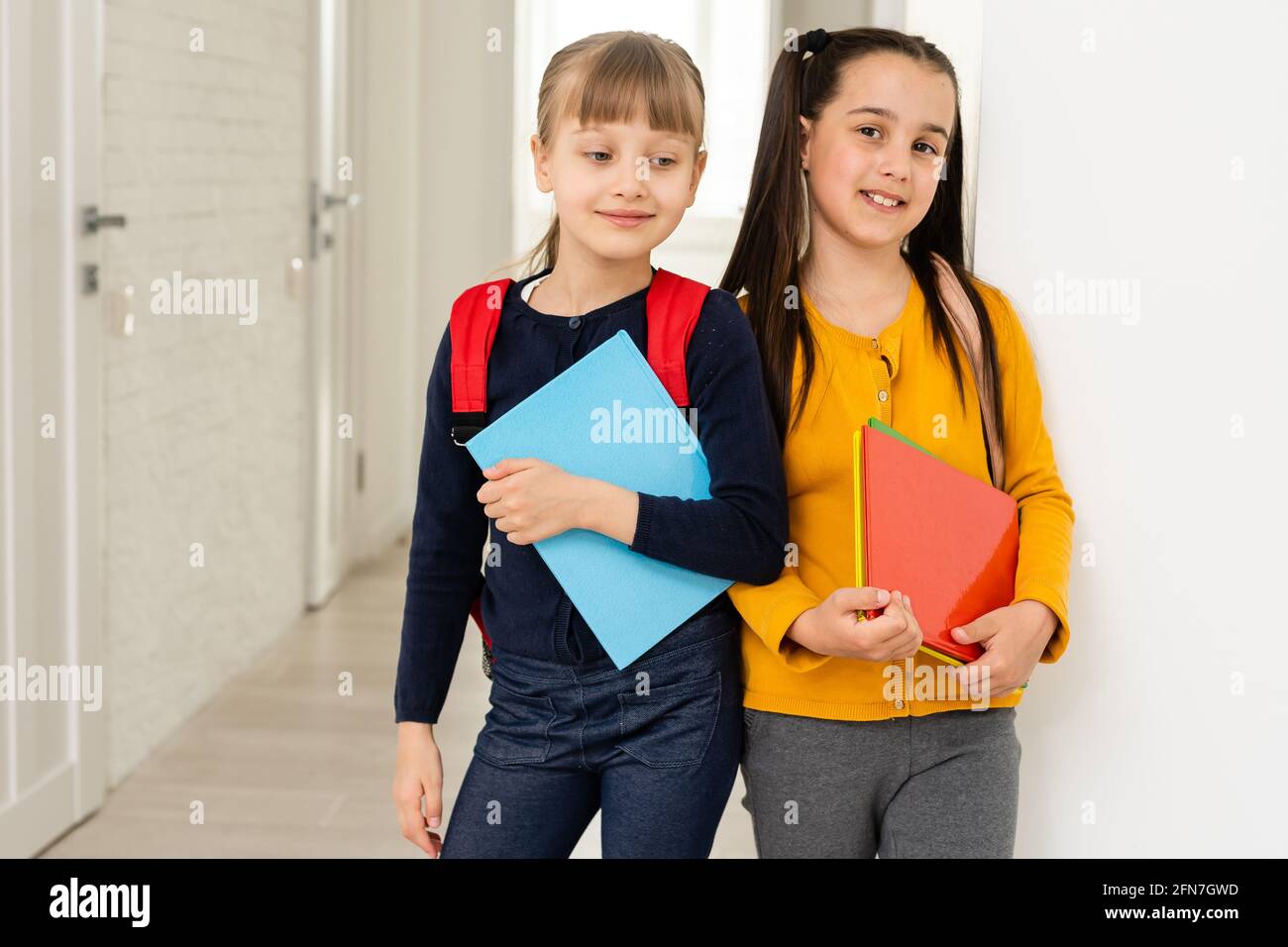Two pupils of elementary school, Back to school Stock Photo - Alamy